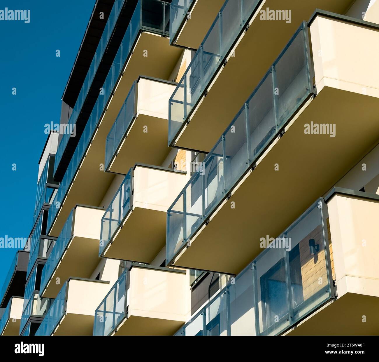 Glass balconies of modern house building, block of flats. Condominium ... Glass balconies of modern house building, block of flats. Condominium ...