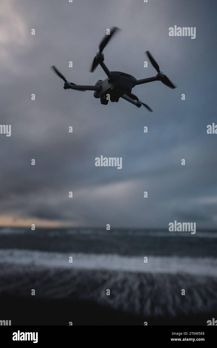 small professional photography and video drone fly over sea Stock Photo ...