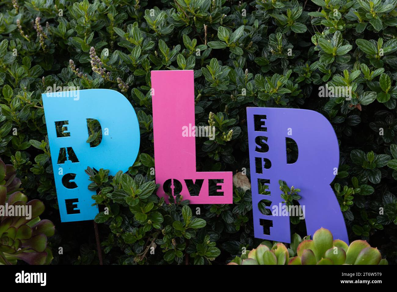 Colorful, wooden signs symbolizing peace, love and respect Stock Photo ...