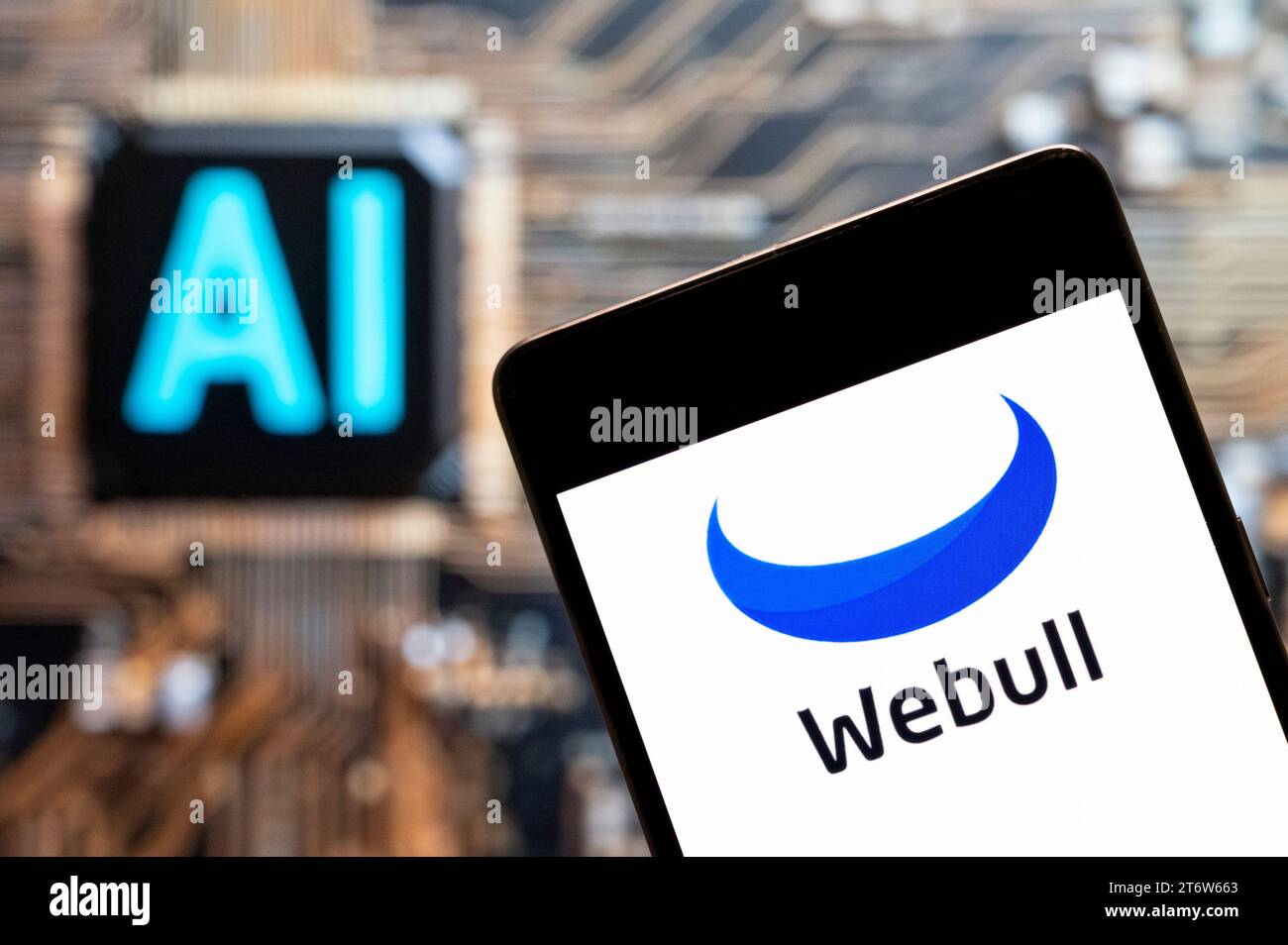 In this photo illustration, the financial trading services company Webull logo seen displayed on ...