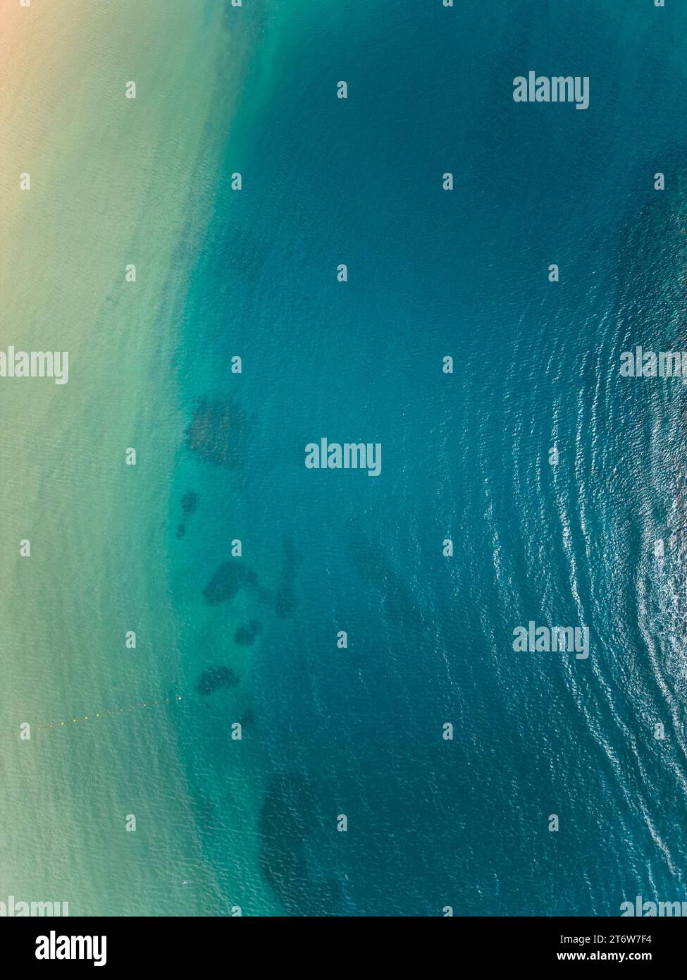 clean sea water and tropical beach, idyllic coast of blue ocean, aerial ...