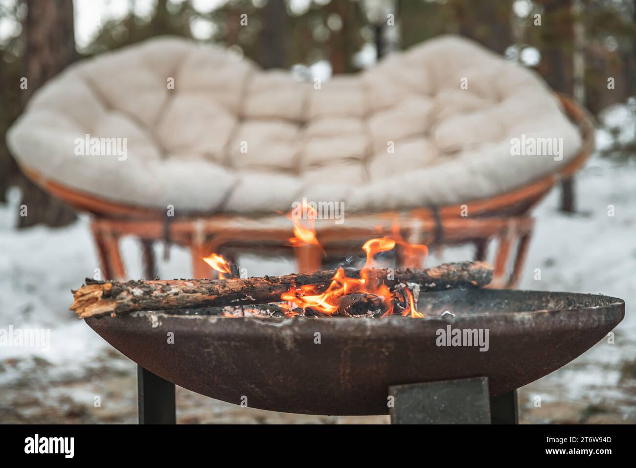 fire campfire bowl outdoors in winter, couch. cozy atmosphere Stock ...
