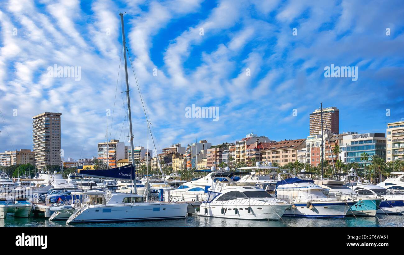 Alicante, Spain, a group of yachts are docked in the city marina ...