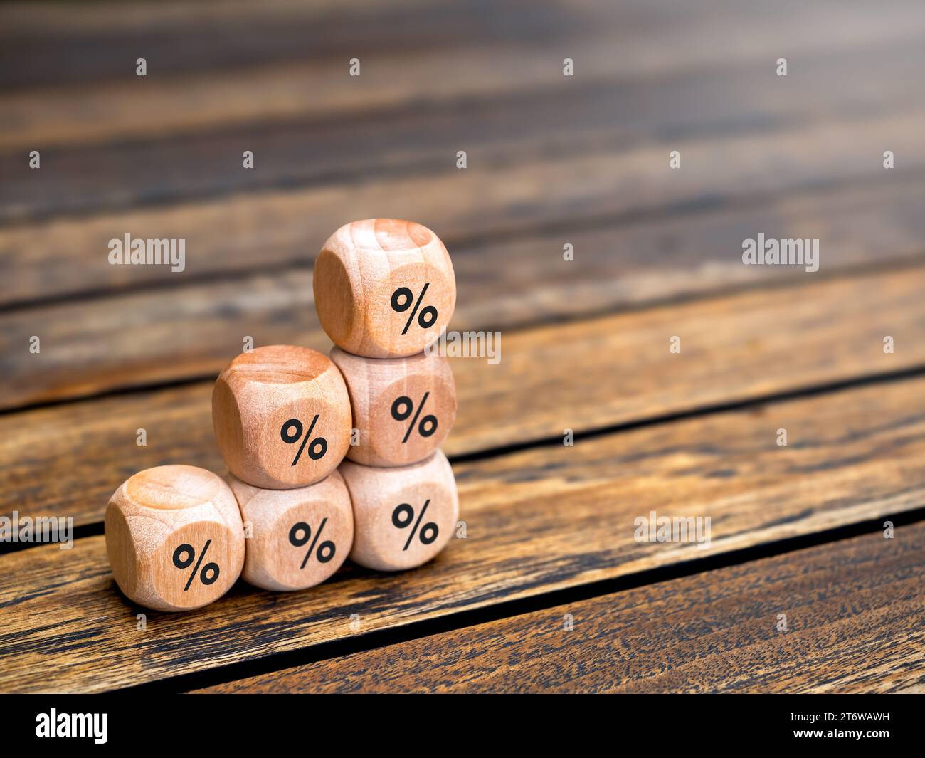 Percentage icon on wooden cube blocks build as business chart steps on ...