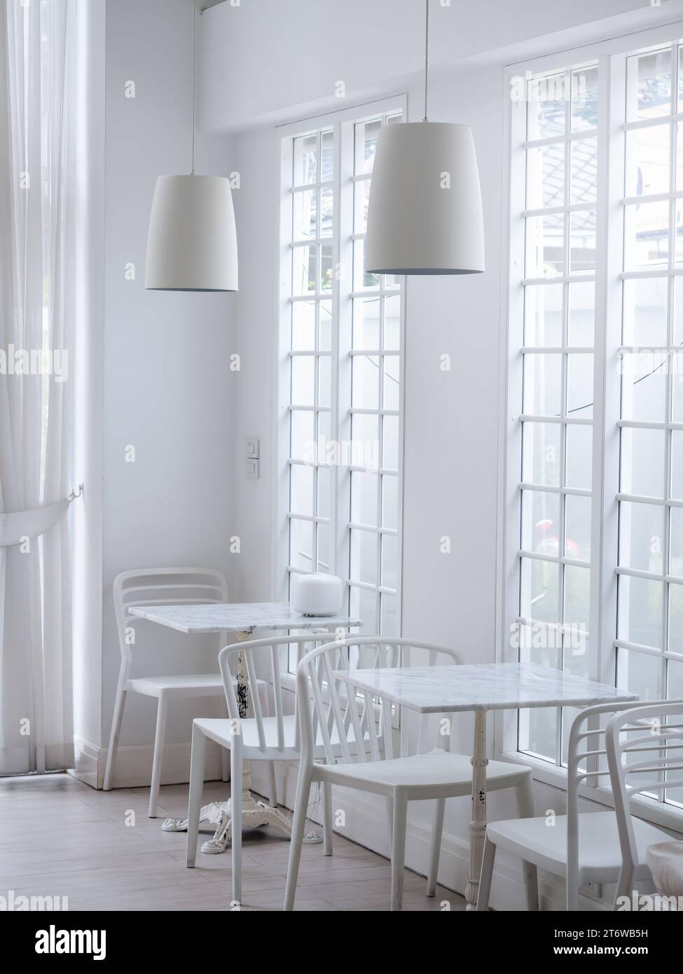 Cylindrical glass lamp hanging hi-res stock photography and images - Alamy