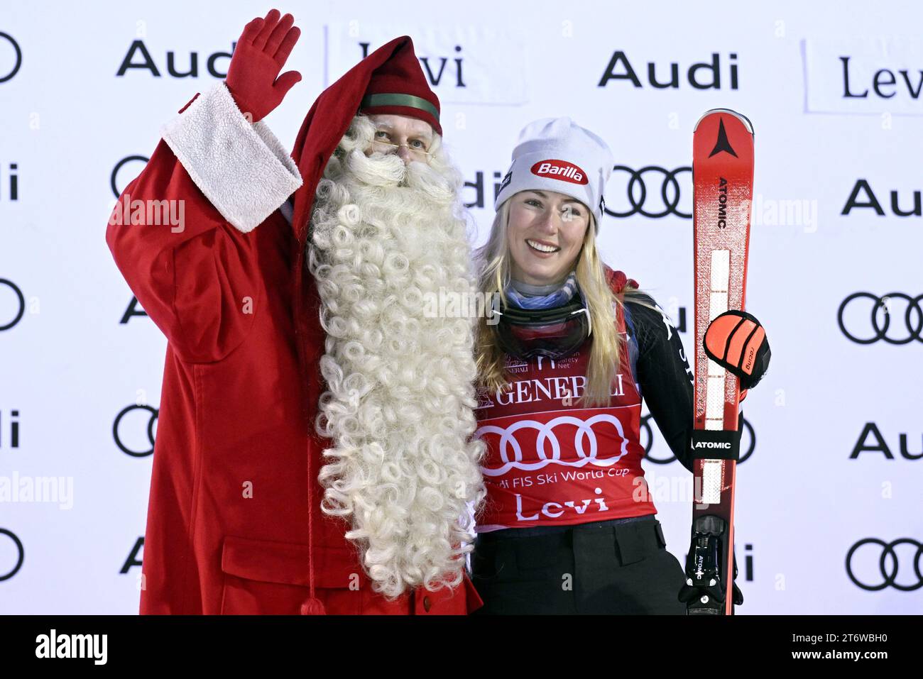 Santa Claus congratulates winner Mikaela Shiffrin of USA after the ...