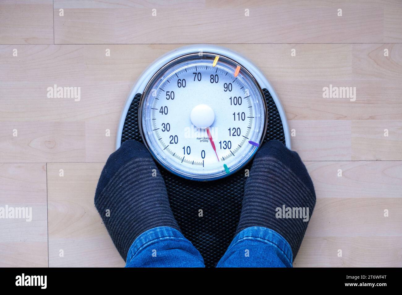 Feet on scales hi-res stock photography and images - Alamy