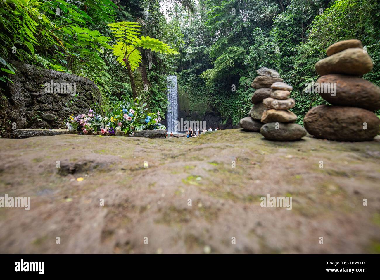 Tibumana Waterfall a small wide waterfall in a green gorge. The river ...
