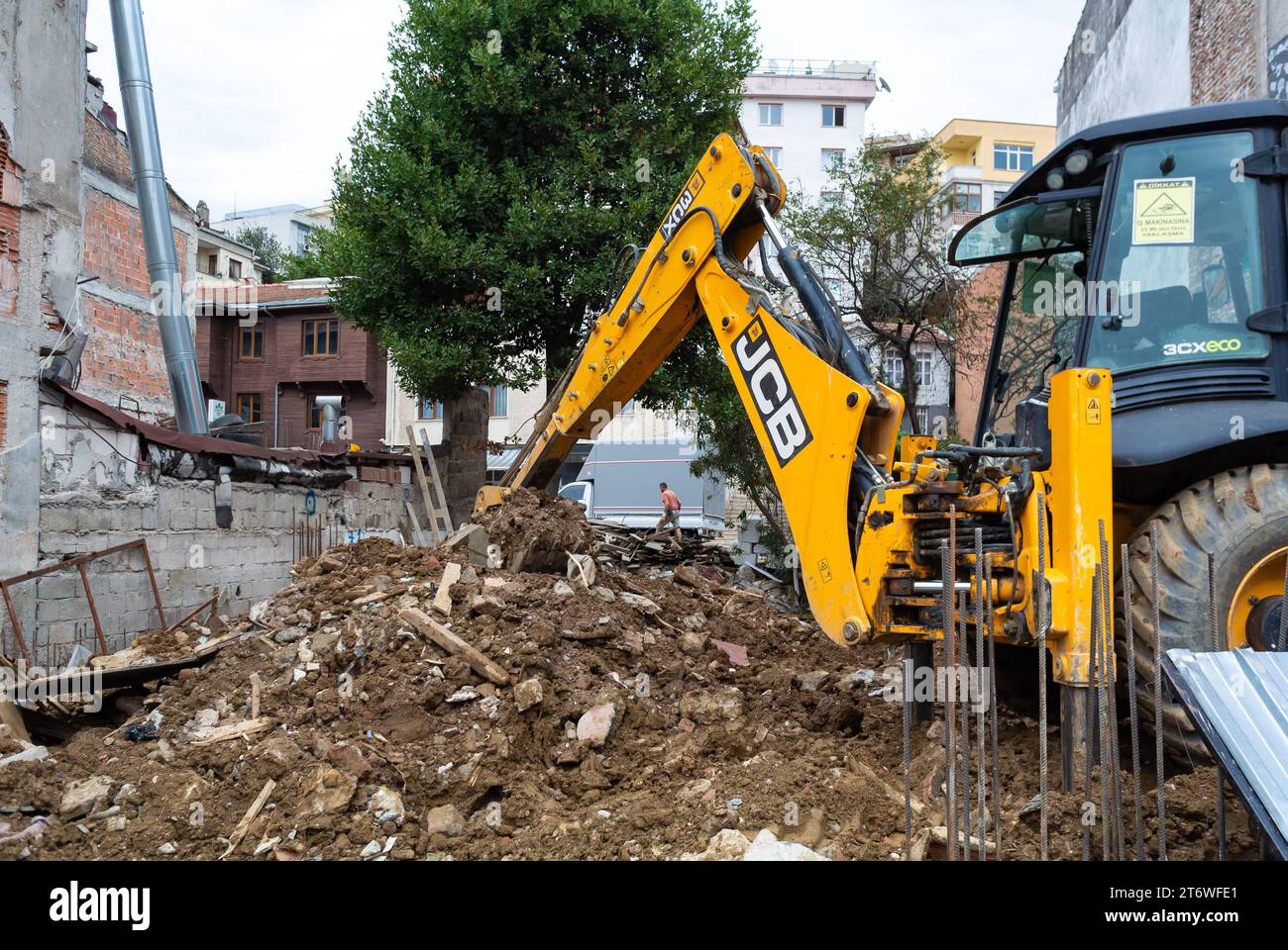 Istanbul, Turkey, A construction site with yellow excavator in uskudar ...