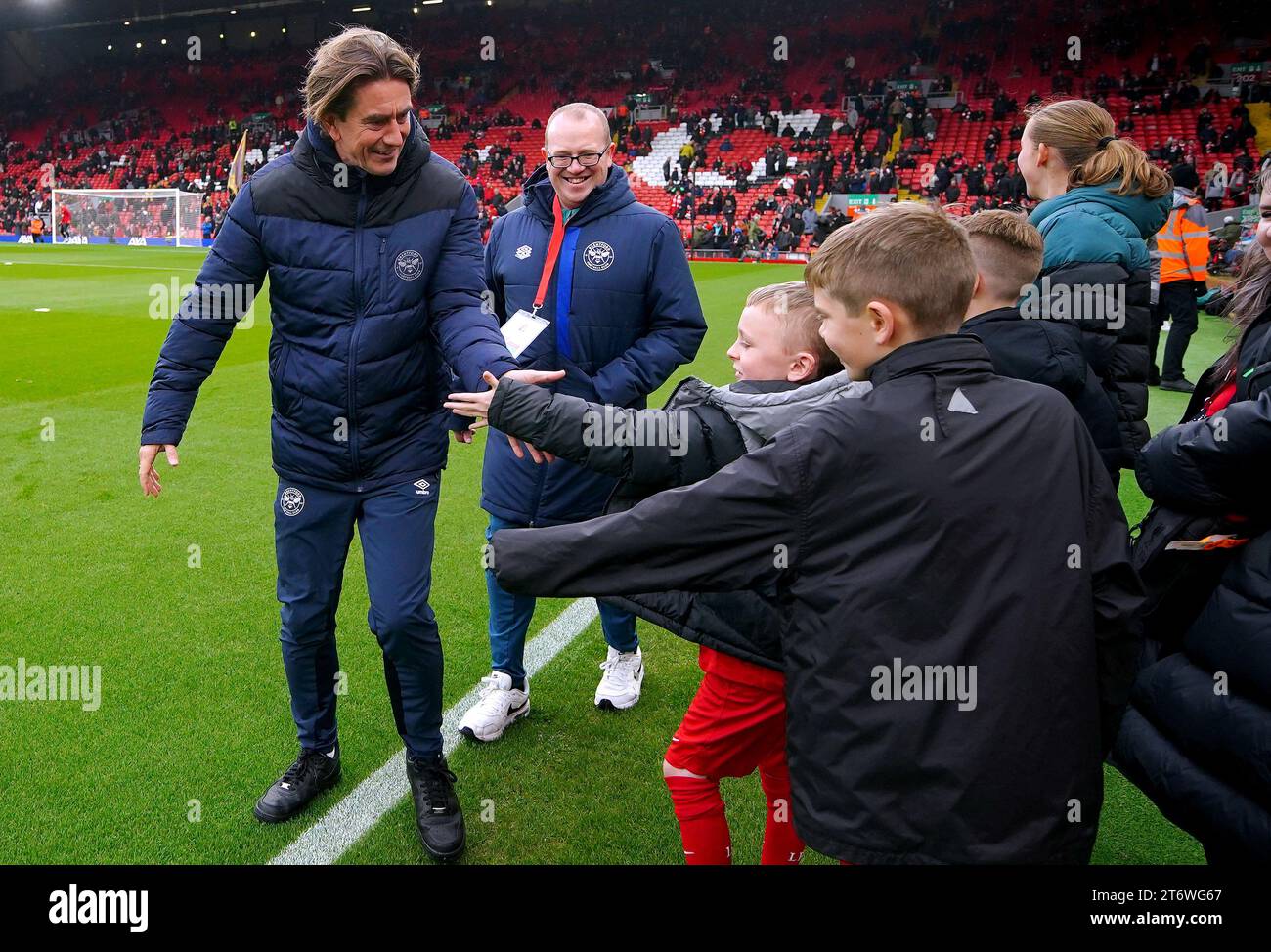 Brentford manager Thomas Frank shakes hands with match day mascots ...