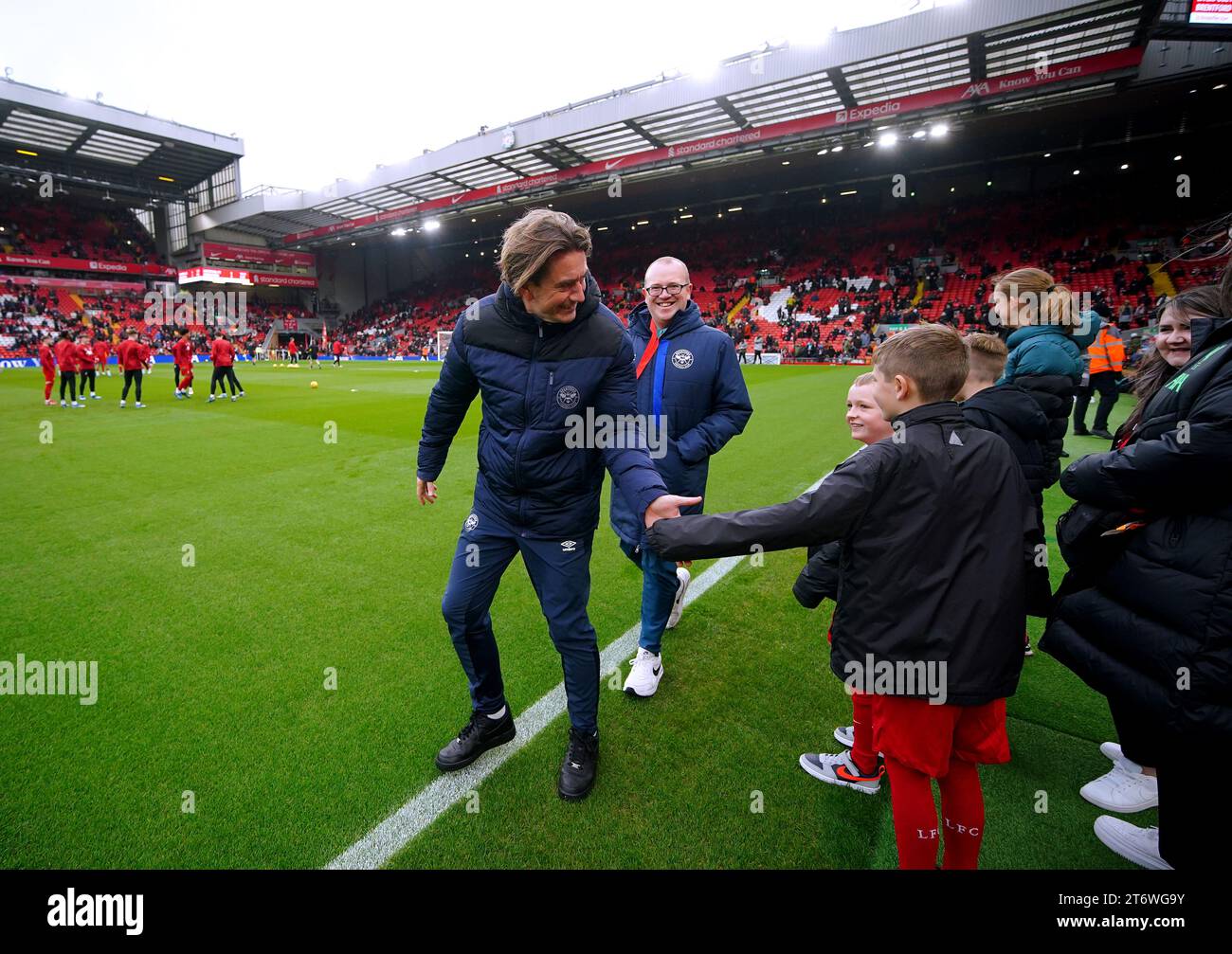 Brentford manager Thomas Frank shakes hands with match day mascots ...