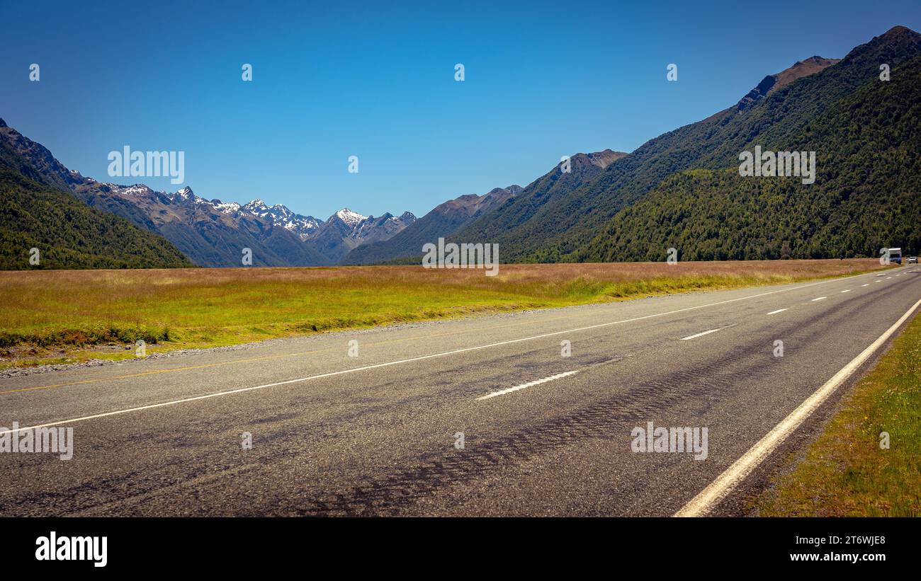 Road through picturesque New Zealand south island location Stock Photo ...