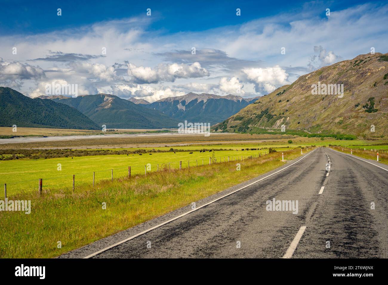 Road through picturesque New Zealand south island location Stock Photo ...