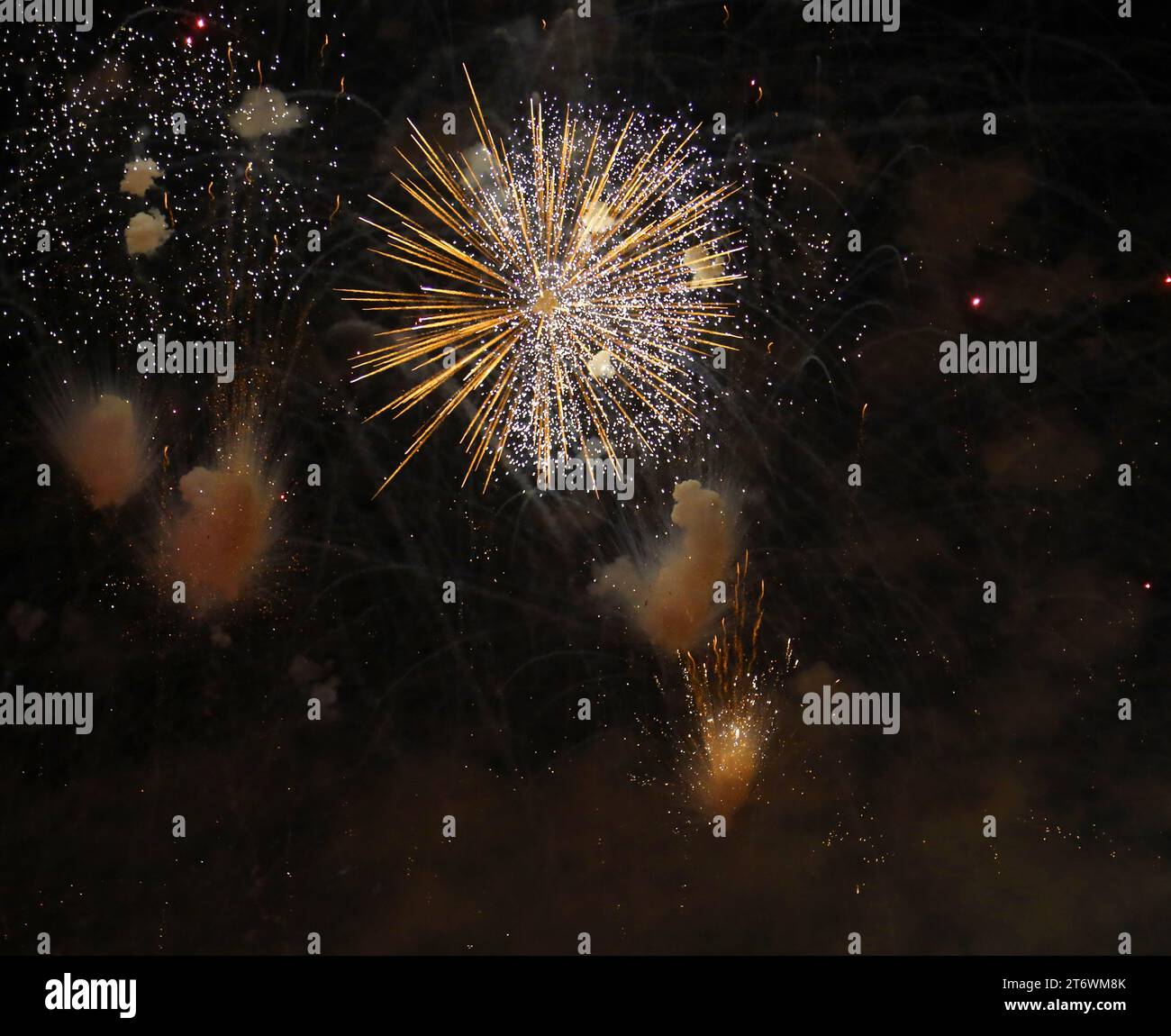 Colorful fireworks show with colorful explosions in the night during ...