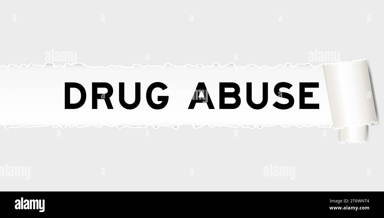 Ripped gray paper background that have word drug abuse under torn part ...