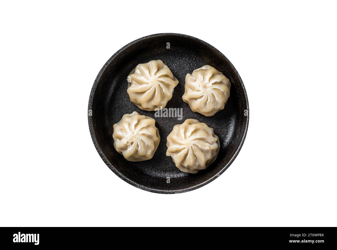 Dim sum stuffed meat dumplings in a pan with herbs. Isolated, white ...