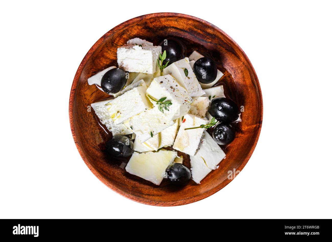 Antipasti platter with fresh feta cheese, bread and olives. Isolated ...