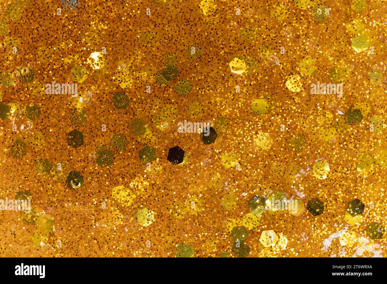 Pattern of gold color slime background macro close up view Stock Photo ...
