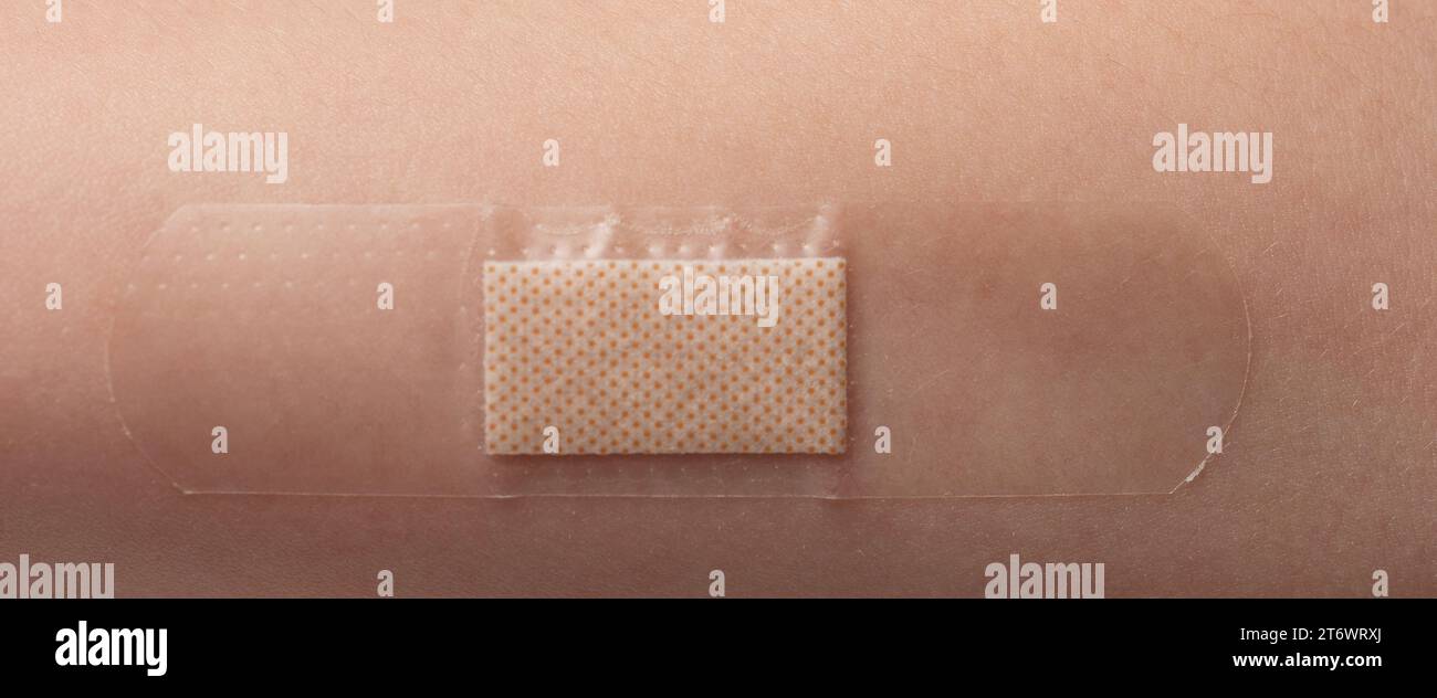 Transparent medical bandage on himan skin close up view Stock Photo - Alamy