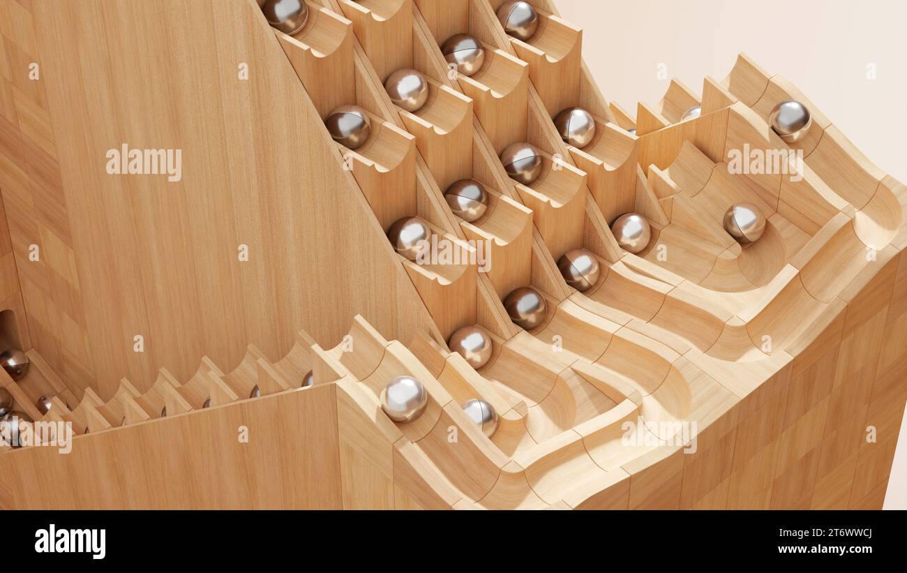 Wooden marble run machine on plain background. Rolling ball toys with ...