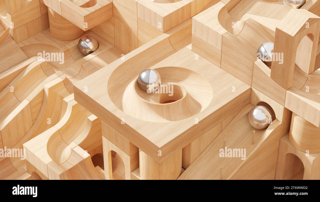 Wooden marble run machine on plain background. Rolling ball toys with ... Wooden marble run machine on plain background. Rolling ball toys with ...