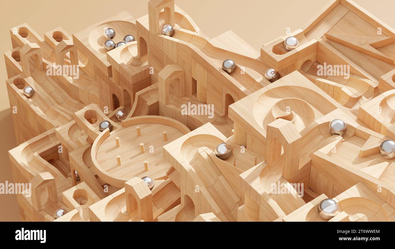 Wooden marble run machine on plain background. Rolling ball toys with ...