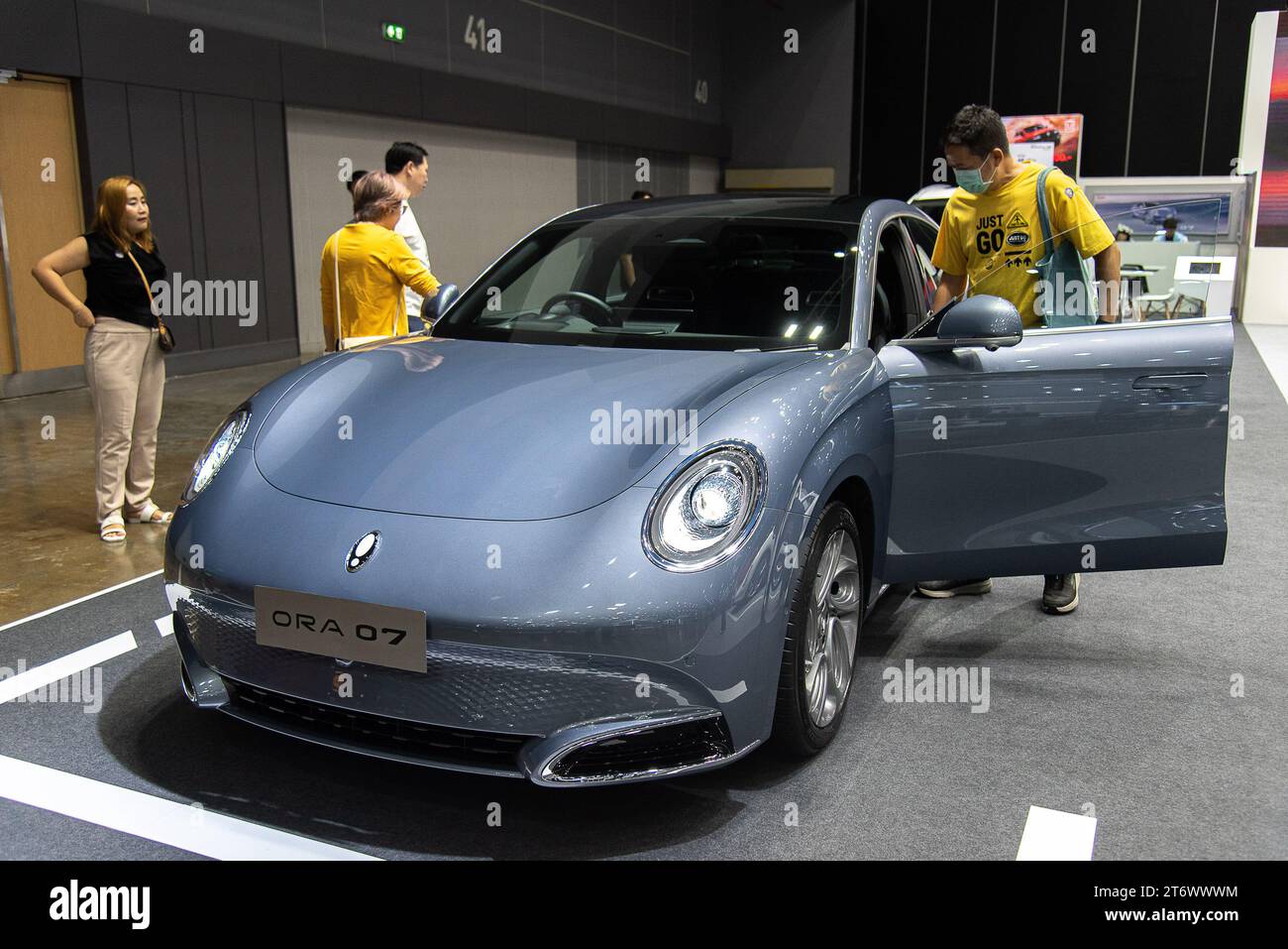 Visitors inspect a GMW Ora 07 car during the Green Technology Expo 2023 ...