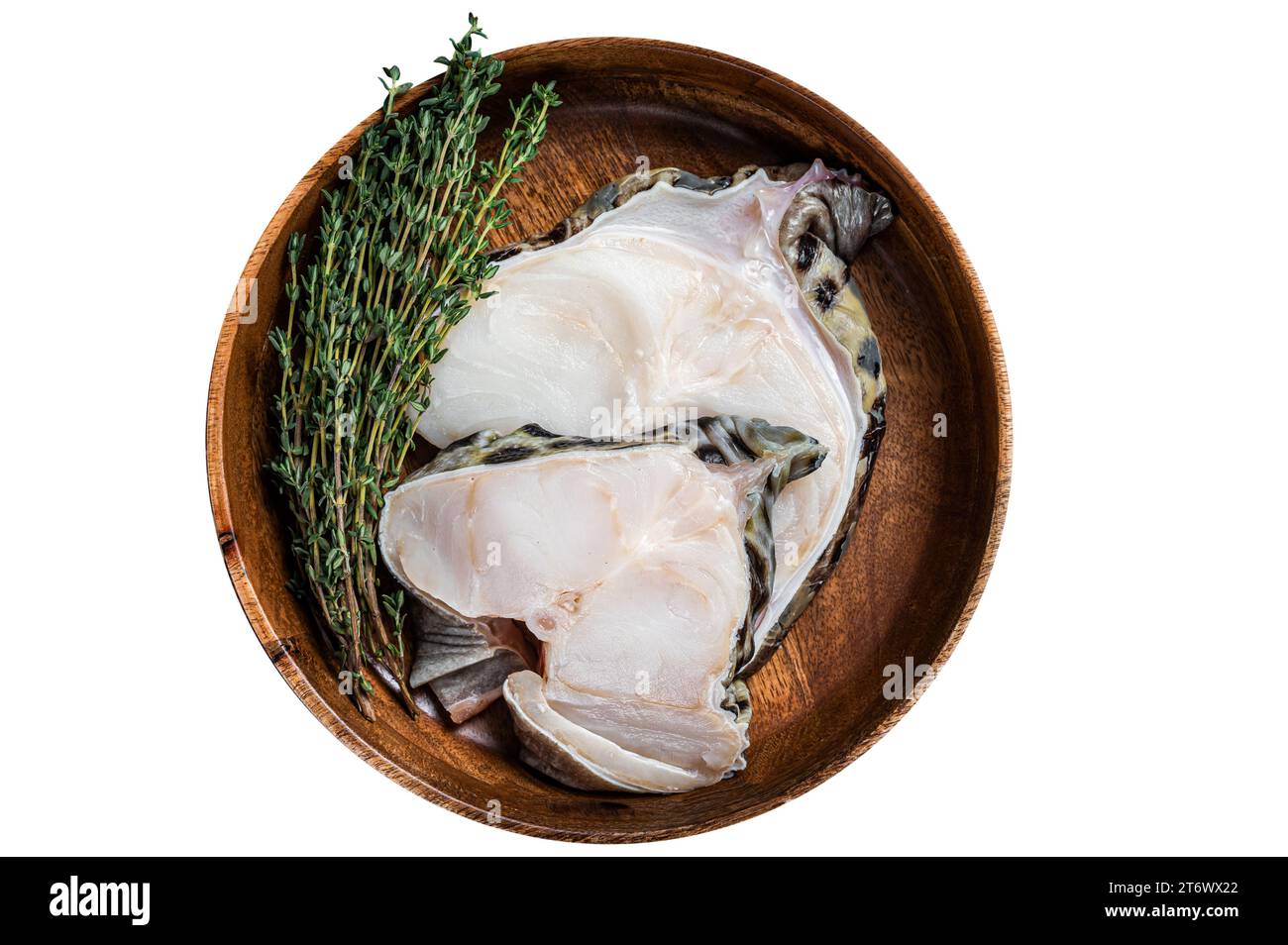 Raw wolffish or wolf fish fillet in a wooden plate. Isolated, white ...