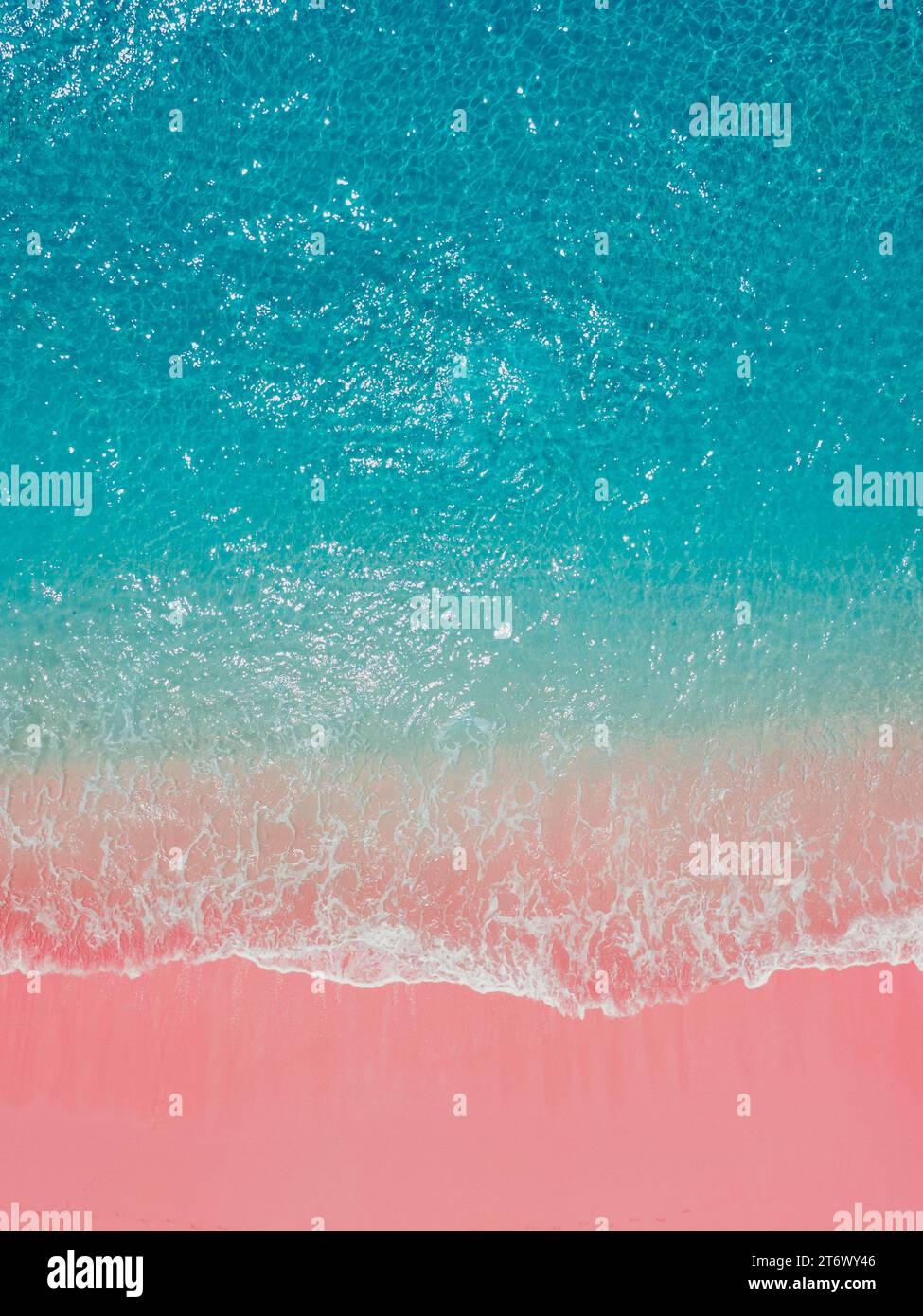 Tropical pink beach with blue ocean on Komodo islands Stock Photo - Alamy