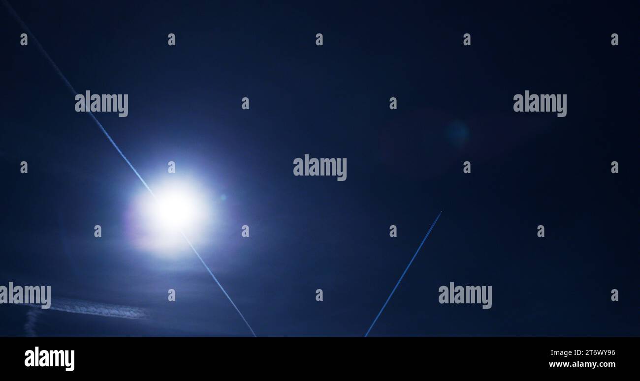 Beautiful yet strangely unsettling view of jet planes and contrails ...