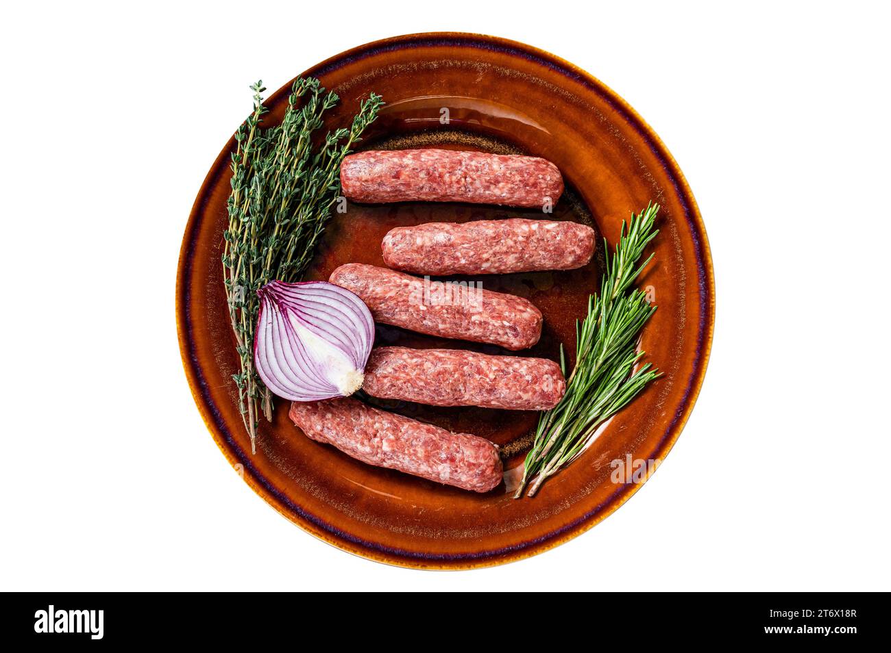 Raw kofta meat kebabs sausages on a plate with herbs. Isolated, white ...