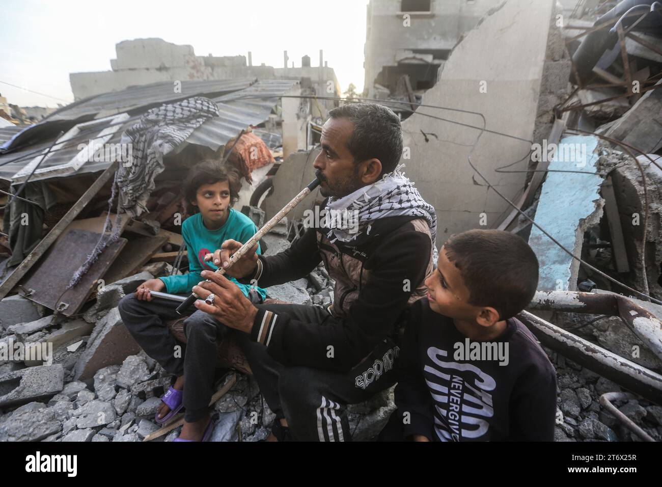 12 November 2023, Palestinian Territories, Rafah: Palestinian flautist ...