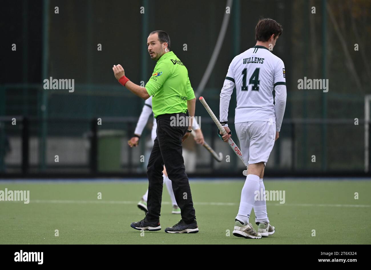 Referee Thimoty Hennes and a hockey game between Braxgata and Waterloo ...