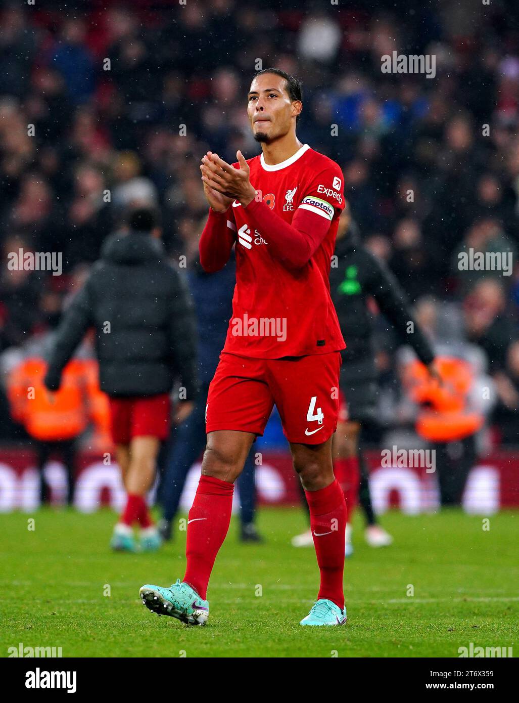 Liverpool's Virgil van Dijk applauds the fans at the end of the Premier ...