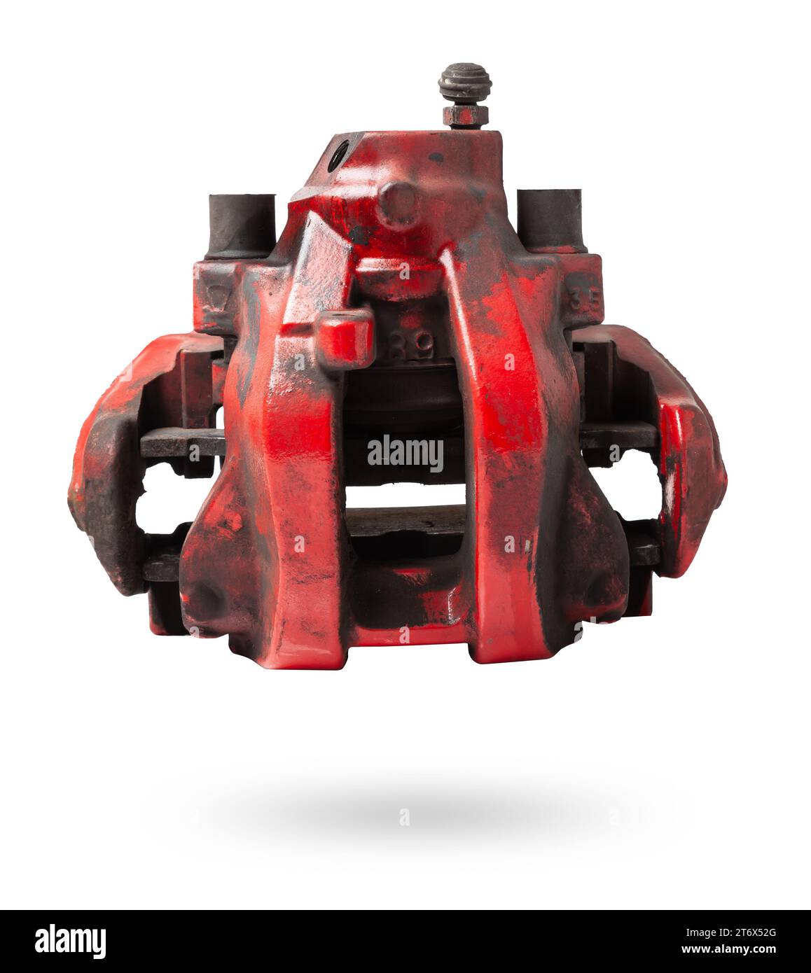 Old red metal brake caliper on a white background for replacement ...