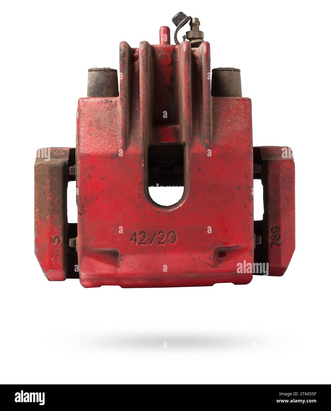 Old red metal brake caliper on a white background for replacement ...