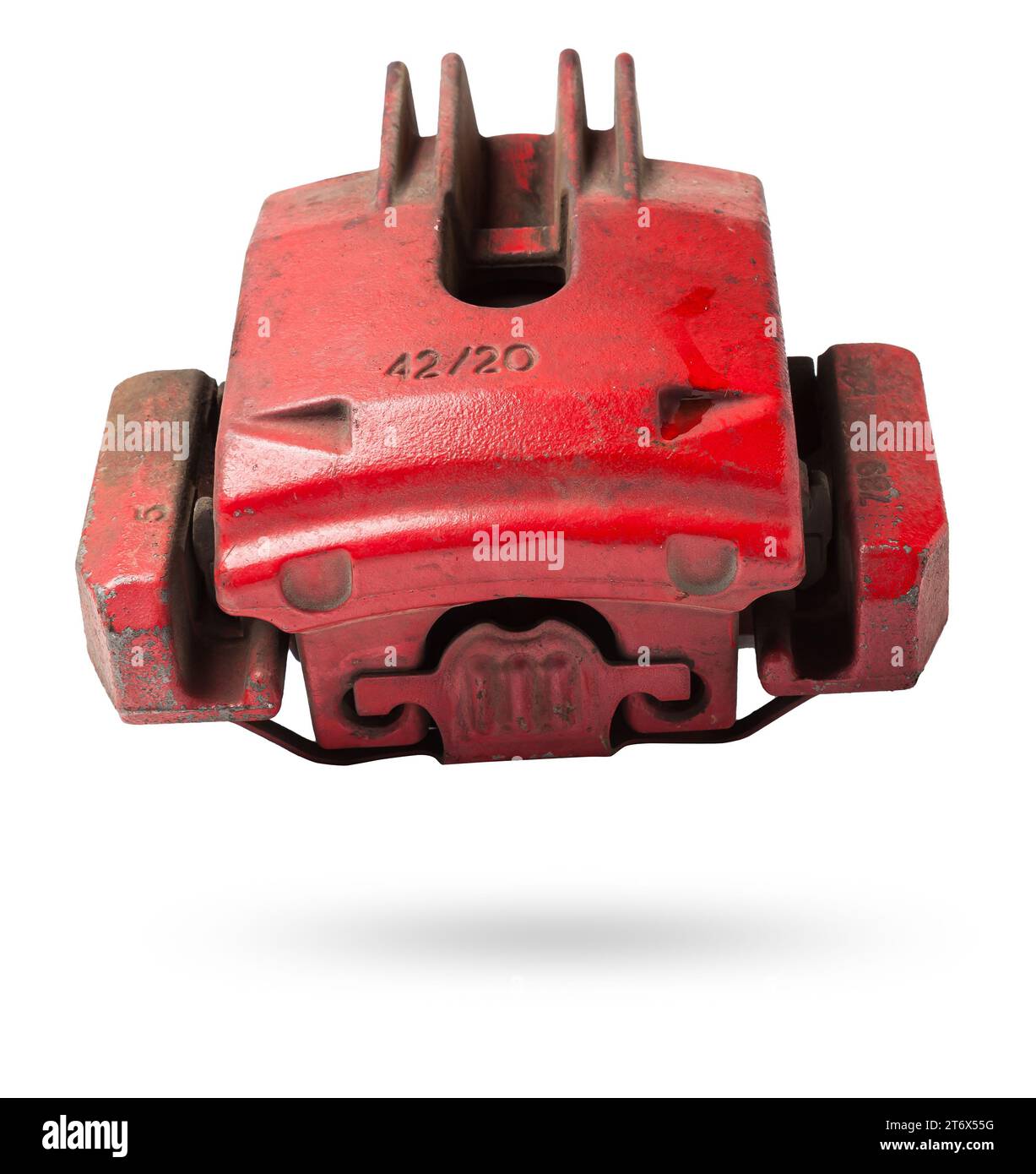 Old red metal brake caliper on a white background for replacement ...