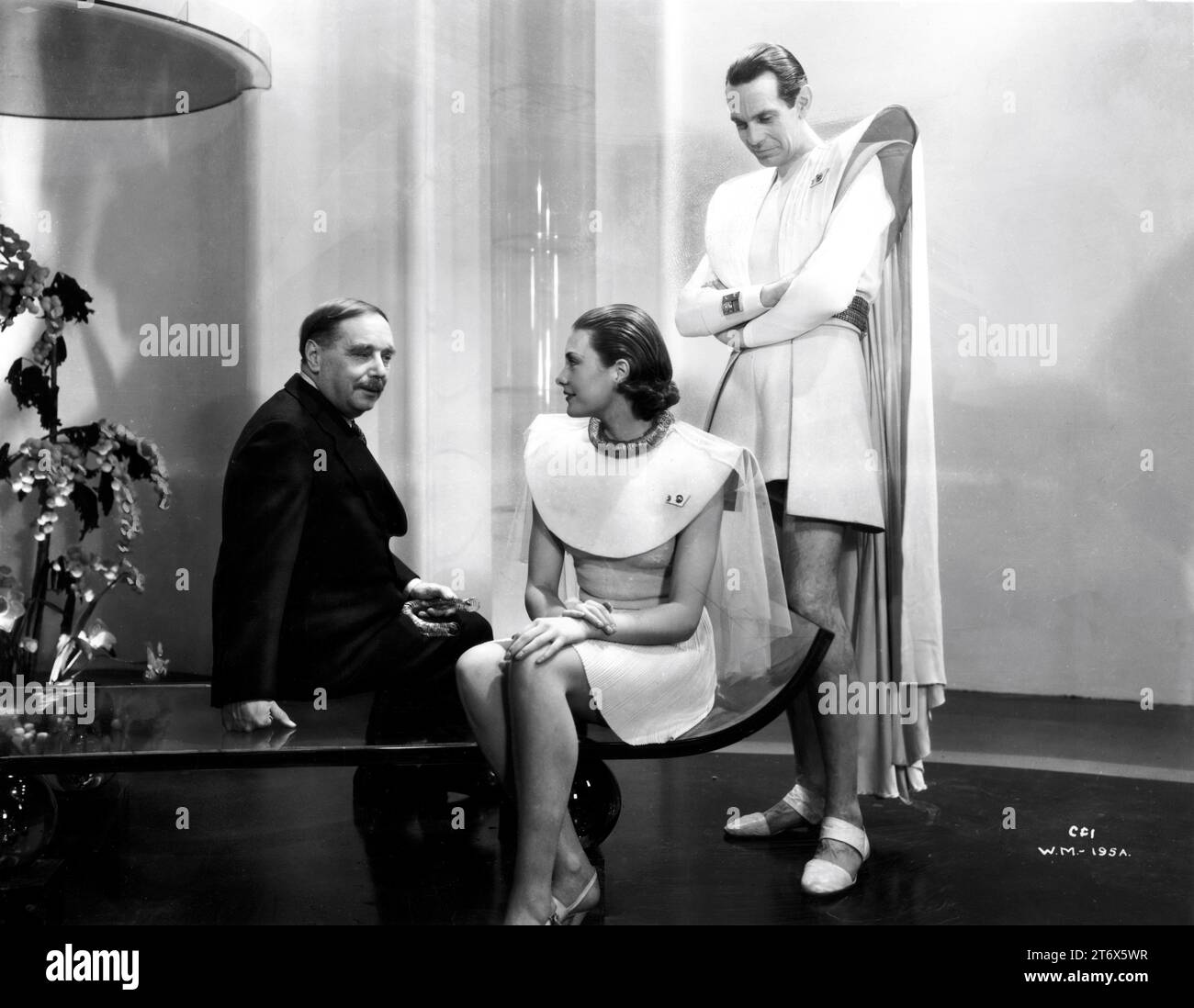 Set Visitor H.G. WELLS with PEARL ARGYLE and RAYMOND MASSEY on set ...