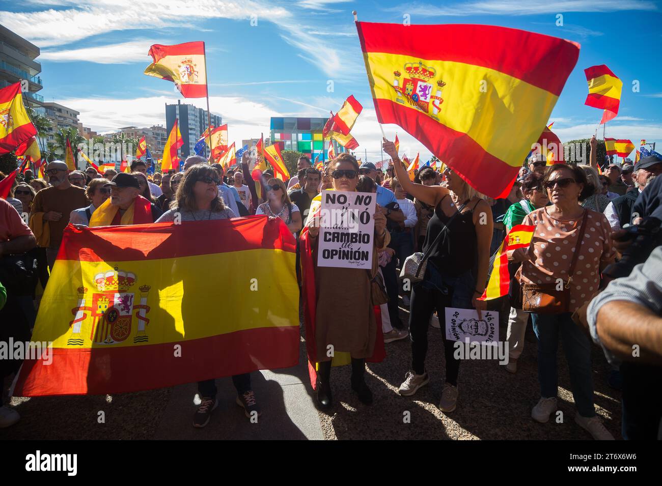 Protesters hold Spanish flags and placards against Spanish Prime ...
