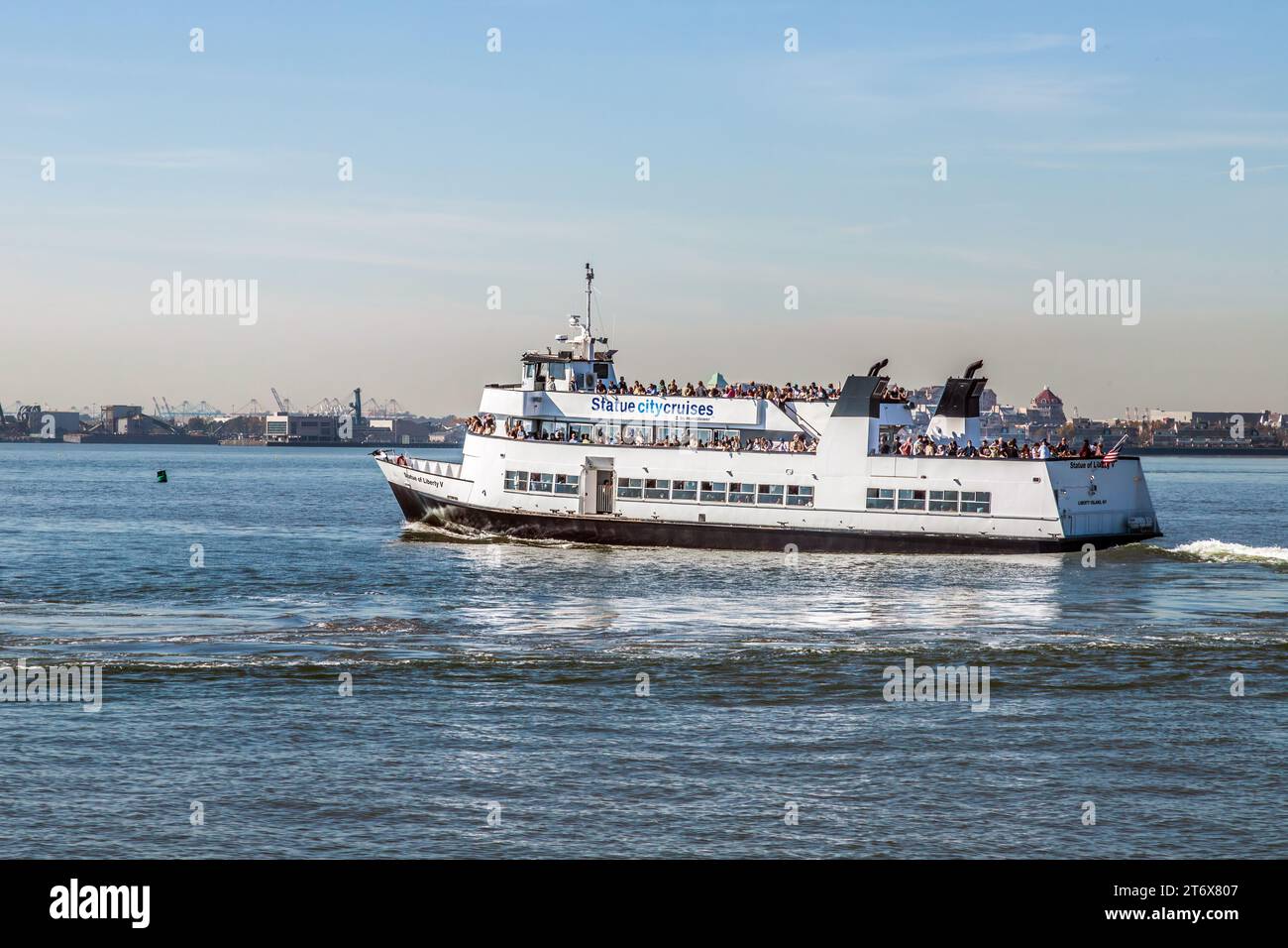Statue Cruises passenger ferry Lady Liberty. Transporting tourists to ...