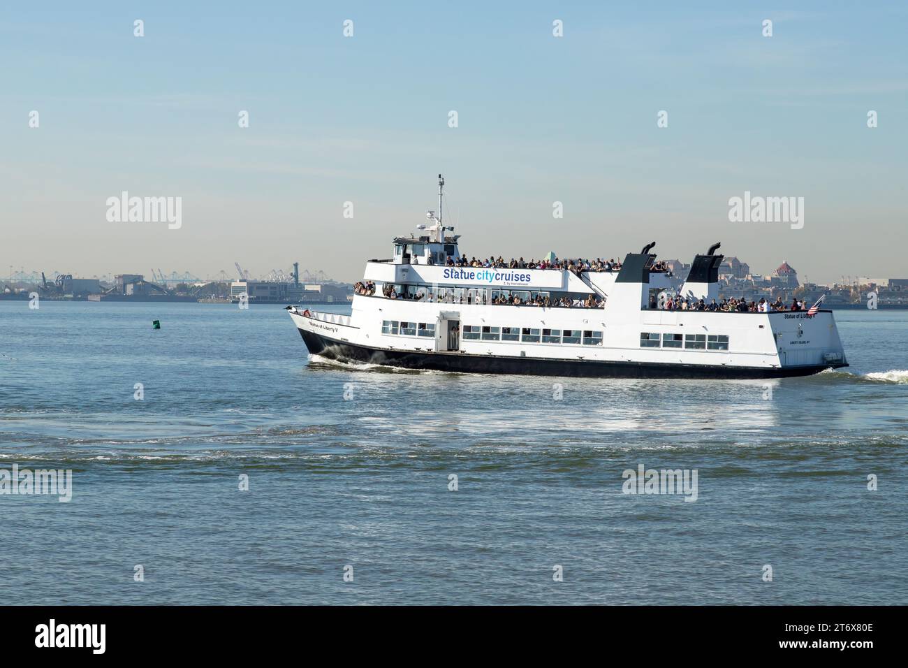 Statue Cruises passenger ferry Lady Liberty. Transporting tourists to ...