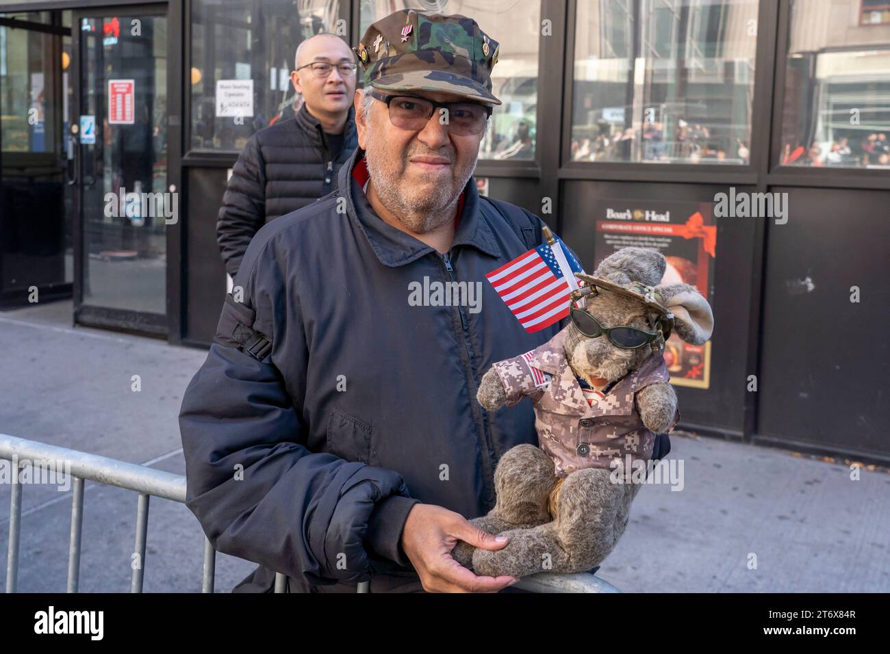 NEW YORK, NEW YORK - NOVEMBER 11: A spectator holds a puppet dress in ...