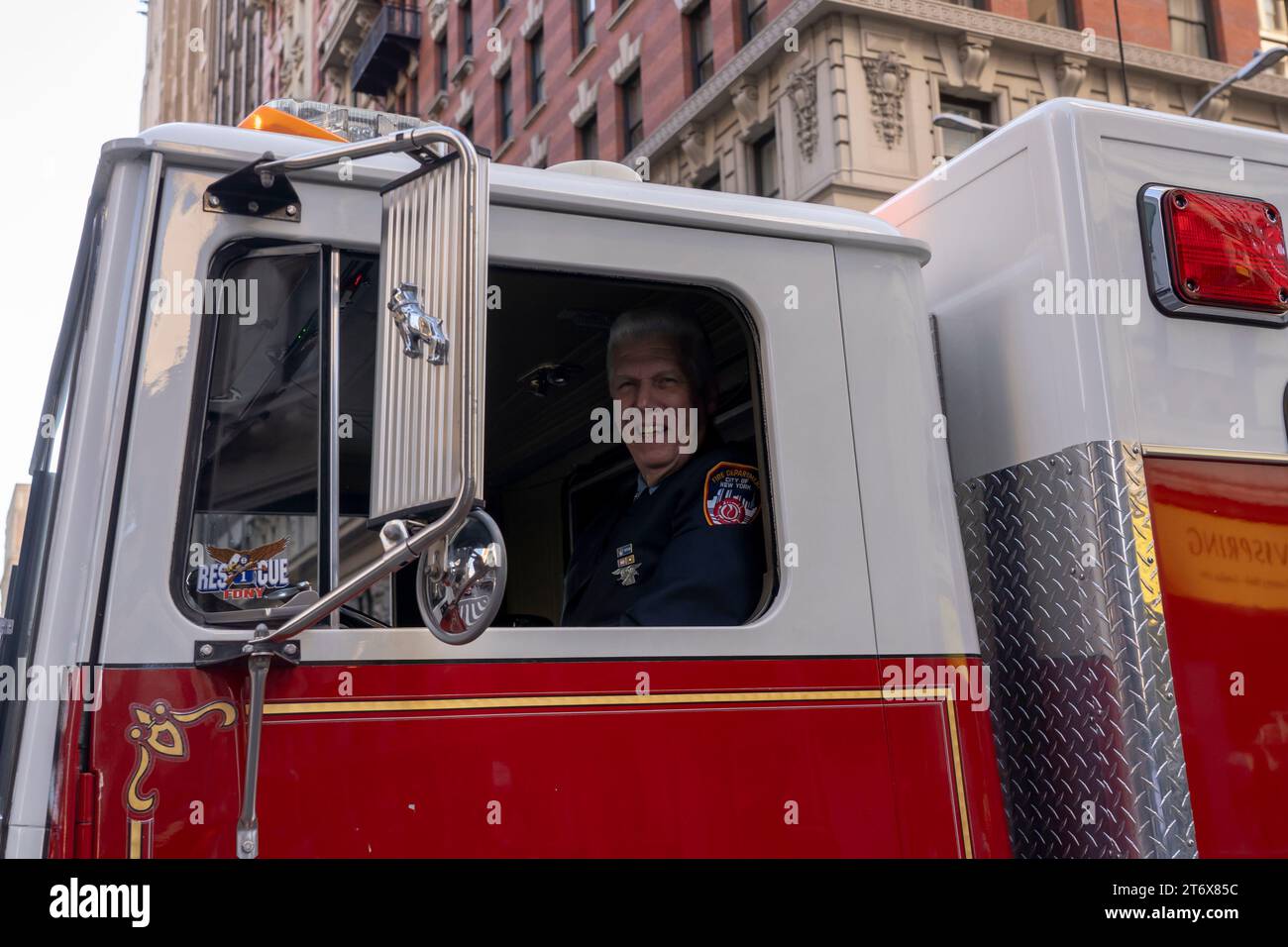 NEW YORK, NEW YORK - NOVEMBER 11: Member of the FDNY drives truck ...