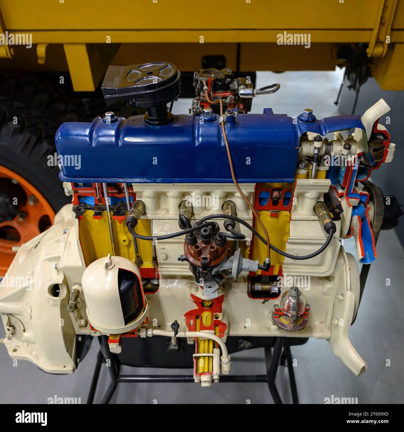 The engine of a mid-20th century truck with a carburetor and candles ...