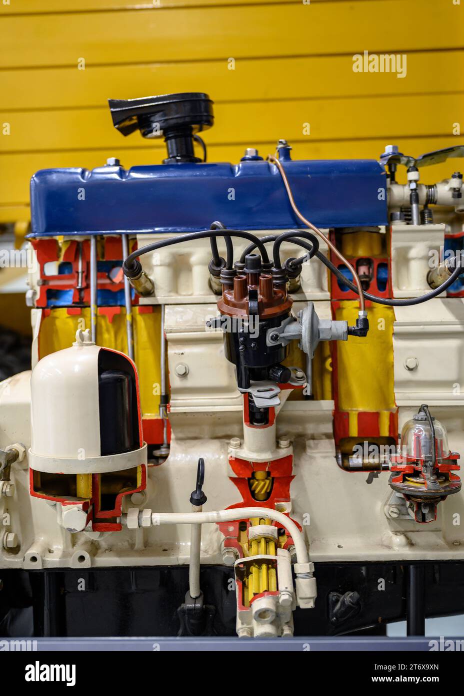 The engine of a mid-20th century truck with a carburetor and candles ...