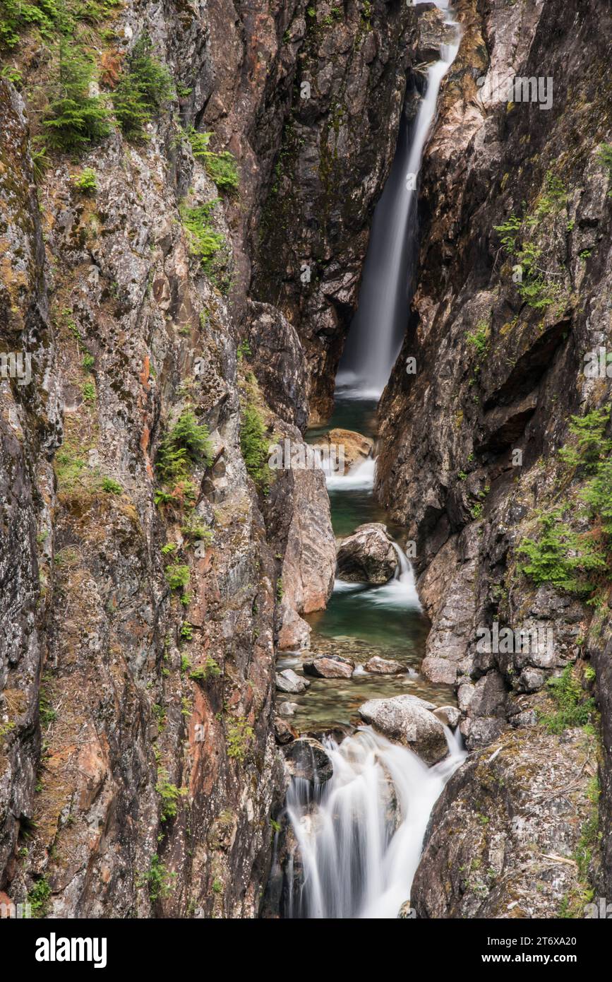 Vertical format scenic landscape of Gorge Creek Falls, a waterfall in ...