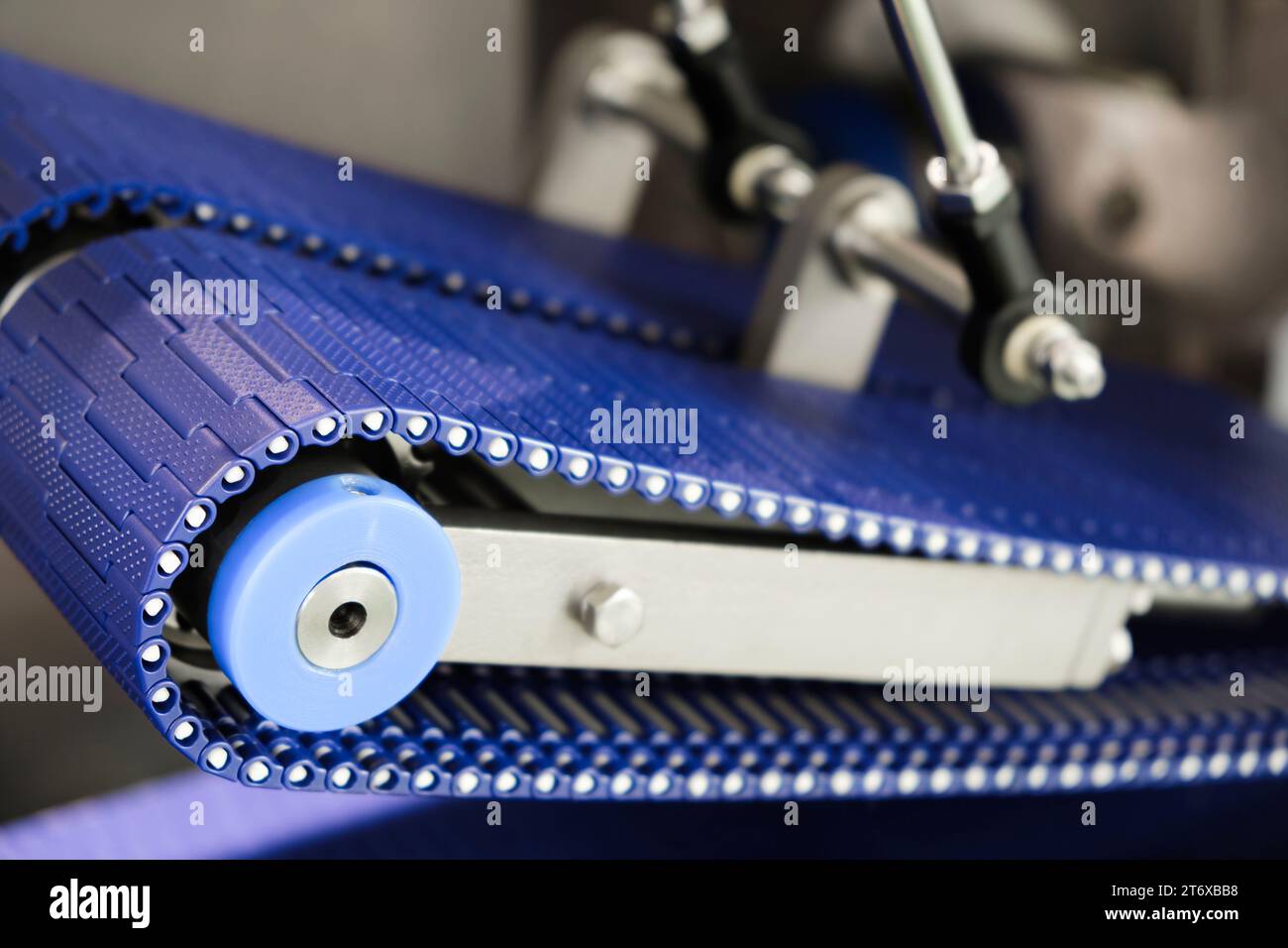 Gear chain drive shaft in conveyor belt is on production line. Timing ...