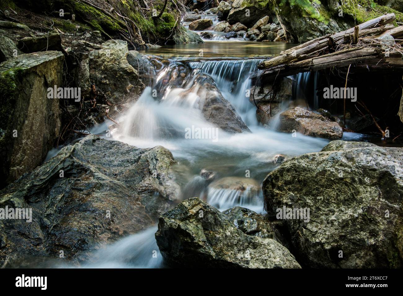 Small waterfall with motion blur suggesting peace and calm, happy creek ...