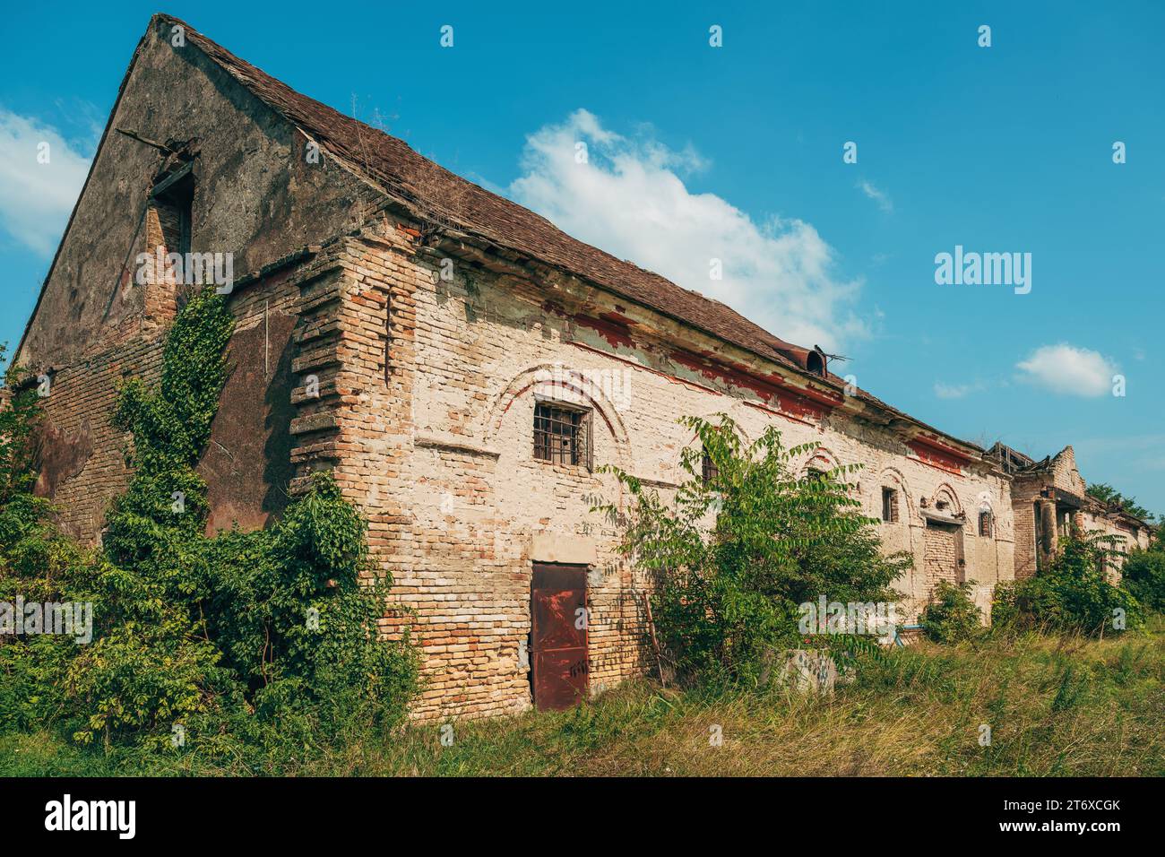 Old abandoned farm building that was once used as horse stable in ...