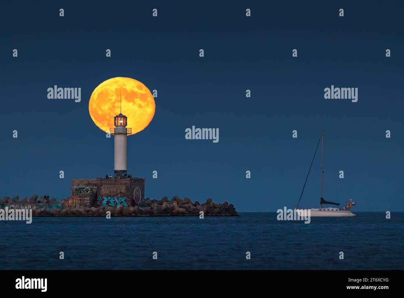 Full moon twilight landscape over sea horizon, sailing yacht boat and ...